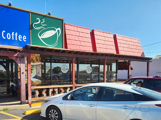A rainbow of flavor awaits! This diner's vibrant exterior is like a beacon for breakfast lovers, promising a feast for both eyes and taste buds.