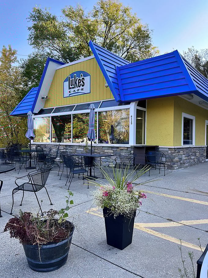 Welcome to breakfast paradise! Luke's Cafe's cheery exterior is like a ray of sunshine, promising delicious adventures within. Who needs a pot of gold when you've got a blue-roofed diner?