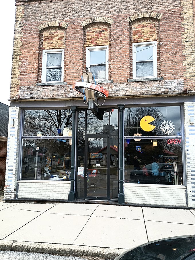 Step into a time warp! This brick facade hides a treasure trove of nostalgia, with Pac-Man himself inviting you to chomp your way through memory lane.