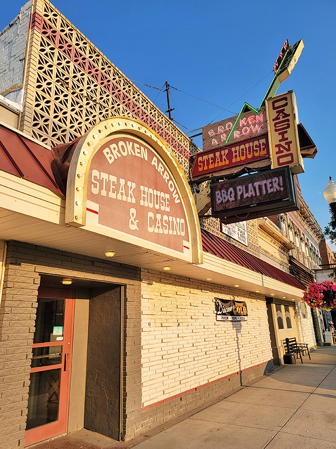Neon dreams and sizzling steams! This vintage facade is like a beacon for hungry souls in the Montana night.