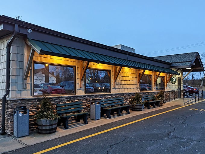 A cabin in the woods? Nope, it's The Cabin Restaurant, where culinary adventures await. This rustic exterior hints at the cozy charm and mouthwatering delights inside.
