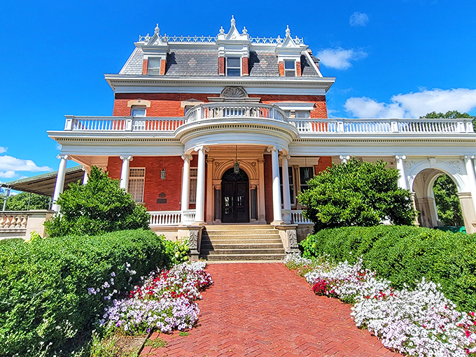 A Victorian dream come to life! The Ellwood House stands proud, its red brick and white trim beckoning visitors to step back in time.