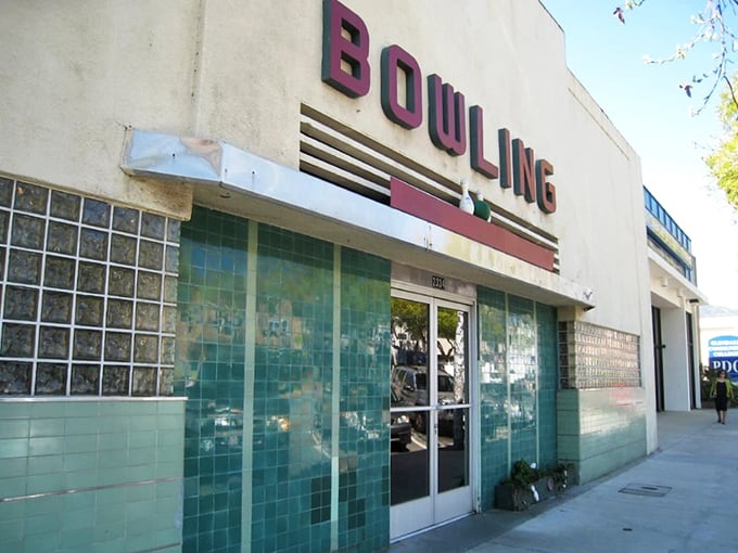 Step into a time warp! This retro facade isn't just eye-catching; it's a portal to the golden age of bowling and burgers.