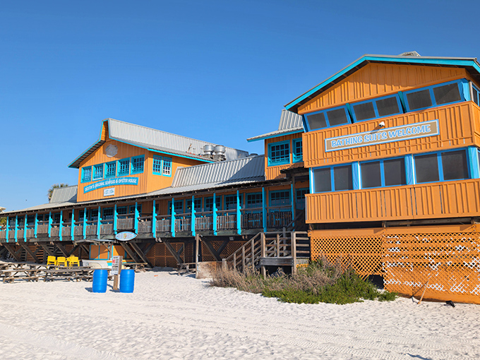 Sunshine yellow and Gulf blue - this seafood shack looks like it was painted with the colors of a perfect beach day!