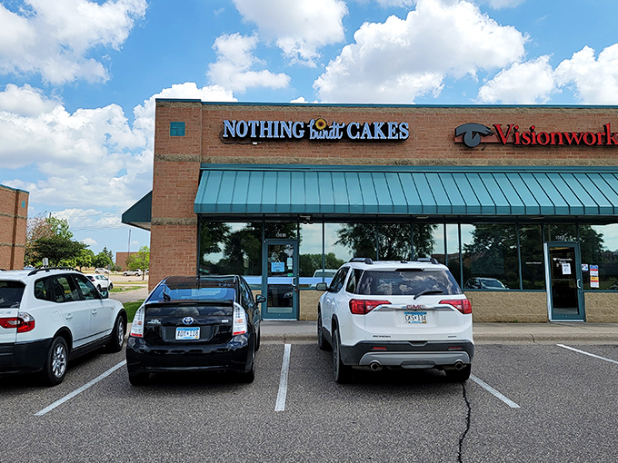 A bundt-iful sight! Nothing Bundt Cakes stands out with its cheerful teal awning, beckoning cake lovers like a sugary oasis in a strip mall desert.