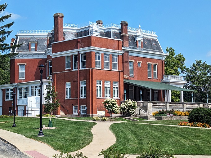 A Victorian dream come to life! The Ellwood House stands proud, its red brick and white trim beckoning visitors to step back in time.