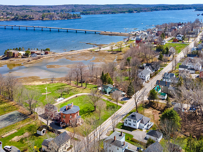 Welcome to Wiscasset: Where New England charm meets small-town quirk. This postcard-perfect scene could make even a lobster feel nostalgic for simpler times.