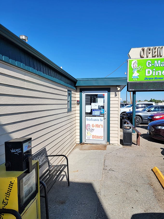Welcome to flavor town! G-Ma's Diner stands proud, its cheery sign promising home-cooked goodness that'll make your taste buds do a happy dance.