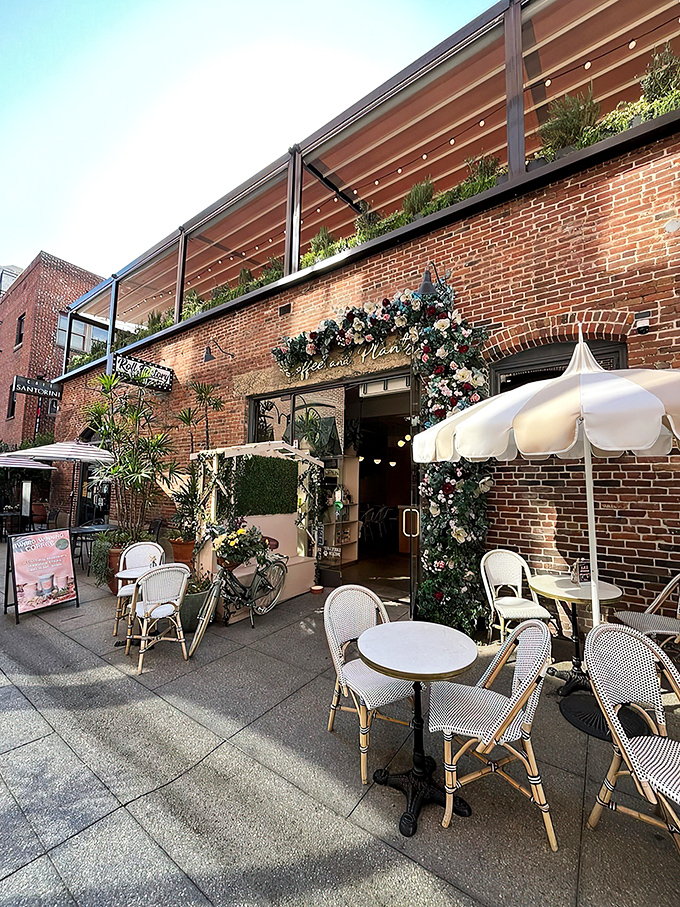 A floral fantasy come to life! This entrance is like Mother Nature's red carpet, inviting you to step into a world where coffee and chlorophyll collide in the most delightful way.