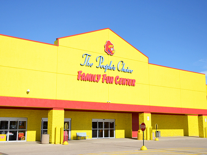 Sunshine on steroids! This dazzling yellow facade isn't just a building, it's a mood-lifter that screams "Fun ahead!" louder than a sugar-rushed toddler.