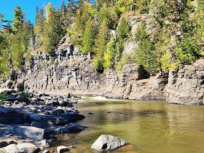 Nature's grand entrance: Rugged cliffs and crystal-clear waters welcome you to Grand Portage State Park. It's like Mother Nature rolled out the red carpet!