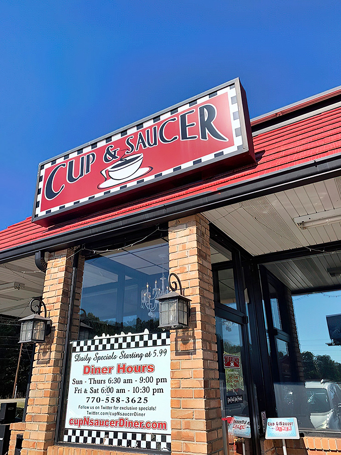 Welcome to Cup & Saucer, where the red roof promises comfort food that'll make your heart sing and your belt buckle beg for mercy.
