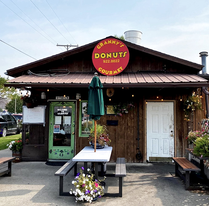 Welcome to donut paradise! Granny's rustic cabin exterior promises sweet treasures within, like a Hansel and Gretel house for grown-ups.
