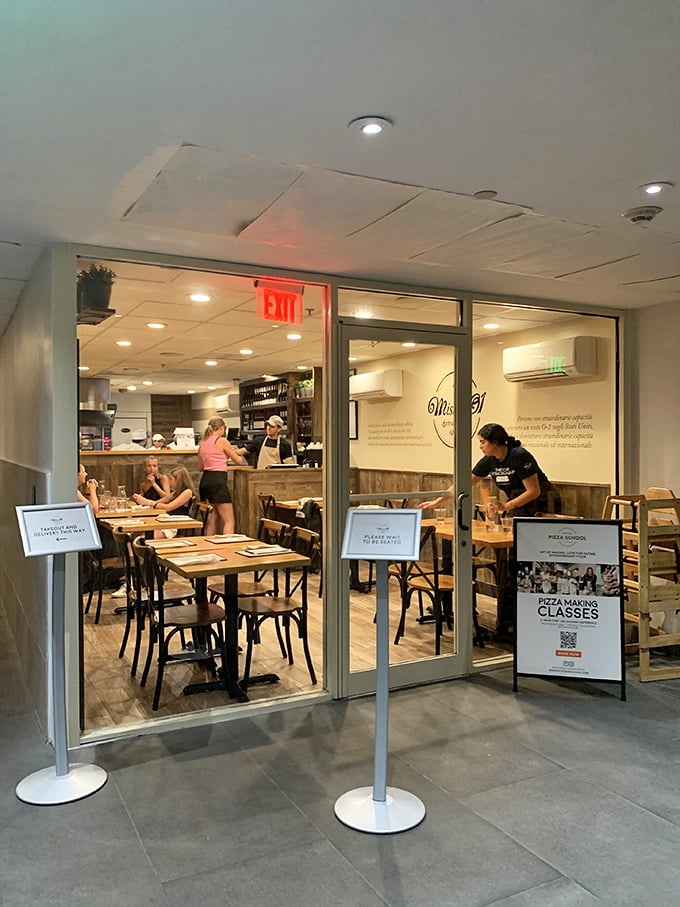 Step into pizza paradise! Mister 01's bustling interior promises a feast for both eyes and taste buds.