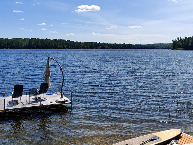 Welcome to paradise! Outlet Beach beckons with its crystal-clear waters and towering pines, like nature's own version of a five-star resort.