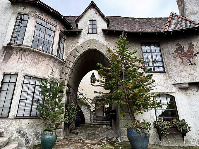 Hogwarts meets Hansel and Gretel in this storybook entrance. Who needs a magic wand when you've got architecture this enchanting?