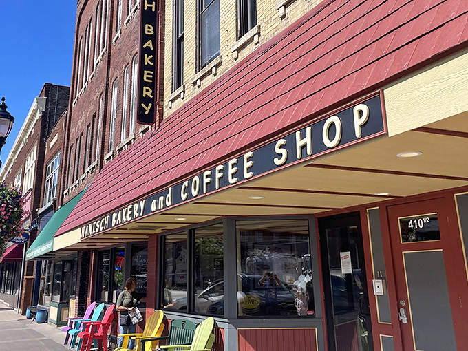 A slice of small-town charm! Hanisch Bakery's brick facade and vintage signage promise sweet treasures within, like a time capsule of deliciousness.
