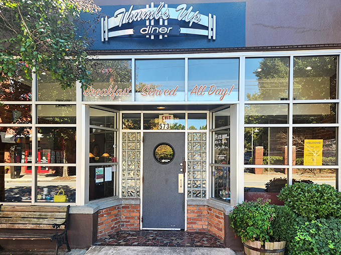 Welcome to flavor town! Thumbs Up Diner's retro-chic exterior promises a journey back in time, with a side of modern culinary magic.
