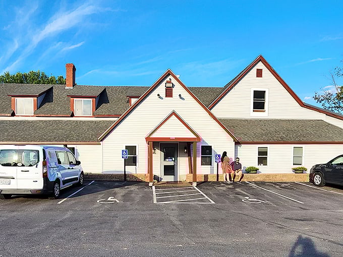 A slice of Americana with a side of sizzle! Rustler's Steak House stands proud, its white clapboard and red trim beckoning hungry travelers like a lighthouse for the famished.