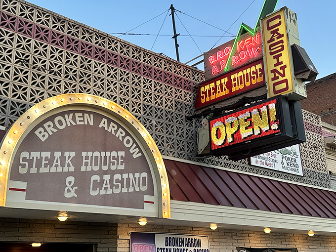 Neon dreams and sizzling steams! This vintage facade is like a beacon for hungry souls in the Montana night.