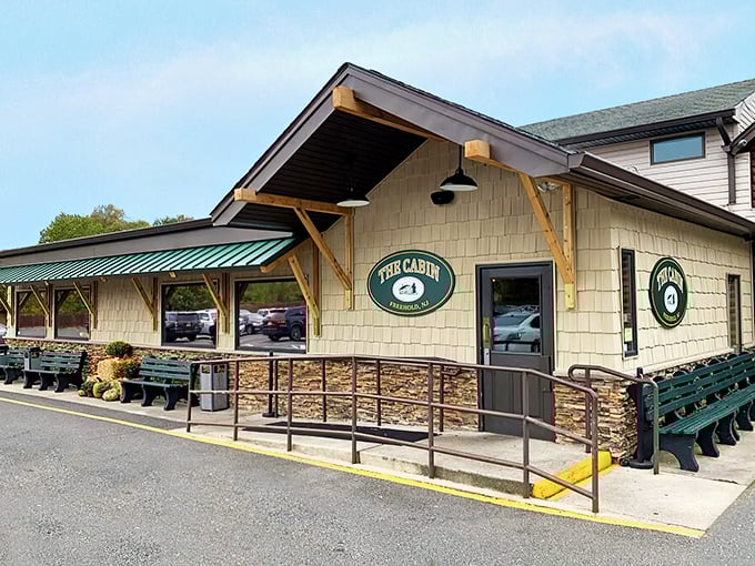 A cabin in the woods? Nope, it's The Cabin Restaurant, where culinary adventures await. This rustic exterior hints at the cozy charm and mouthwatering delights inside.