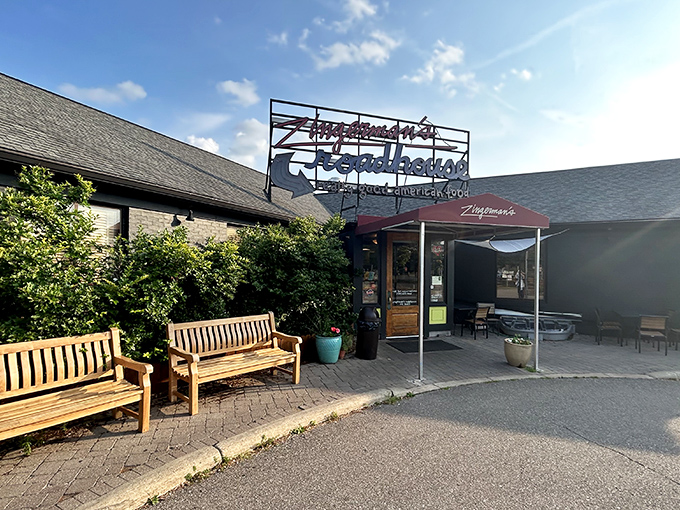 Welcome to flavor town! Zingerman's Roadhouse beckons with its charming exterior, promising a culinary adventure that'll make your taste buds do the cha-cha.