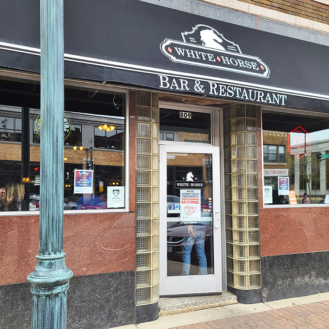 Step right up to burger paradise! The White Horse's classic storefront promises a feast for the senses, with a side of small-town charm.