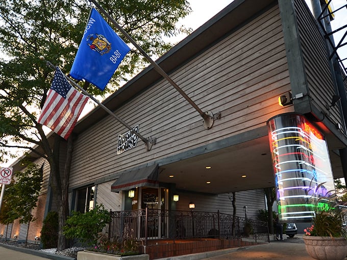 Welcome to flavor town! The Packing House's exterior promises a cozy retreat where comfort food reigns supreme and calories fear to tread.