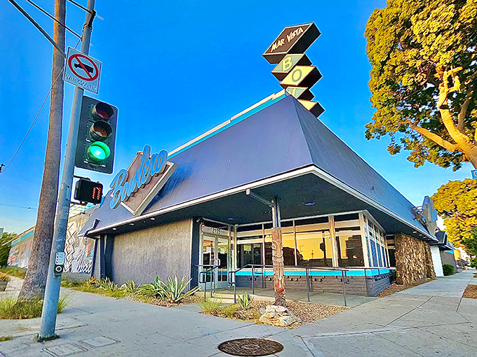 Groovy, baby! This retro-chic exterior is like a time machine to the swinging '60s, complete with a sign that screams "Let's Bowl!"