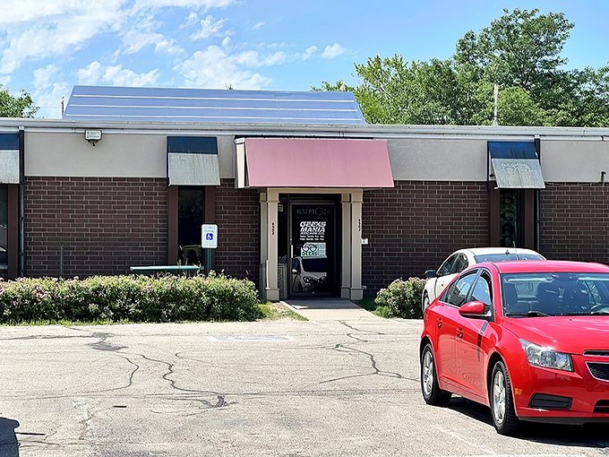 Unassuming exterior, extraordinary interior! This strip mall facade hides a treasure trove of nostalgia and neon-lit joy. Ready to level up your day?