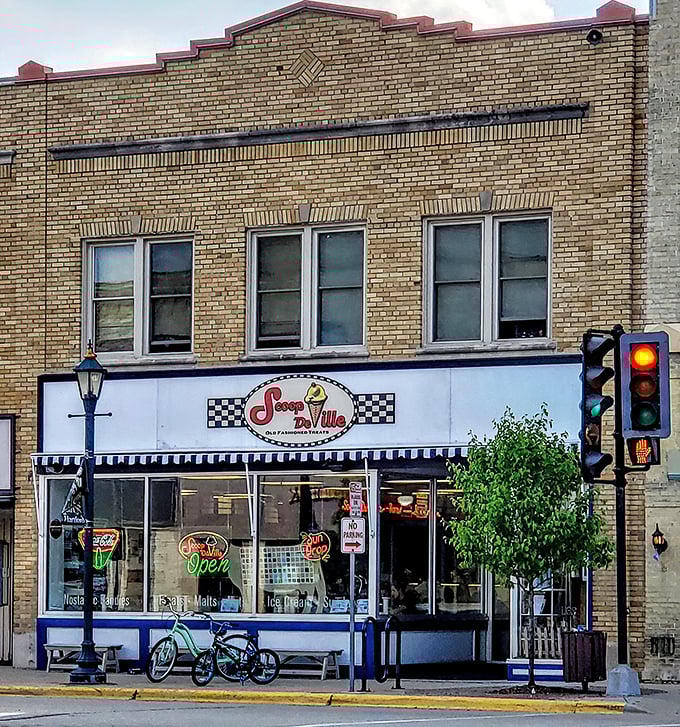 Step back in time! Scoop De Ville's charming storefront is like a portal to the 1950s, complete with a classic awning and neon signs.