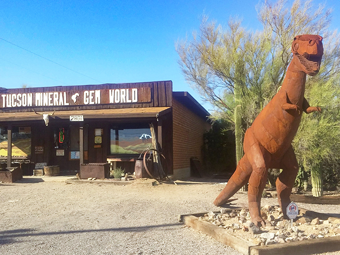 Welcome to Jurassic Park... I mean, Tucson Mineral & Gem World! This rusty T-Rex might not bite, but the shop's treasures inside certainly have bite.