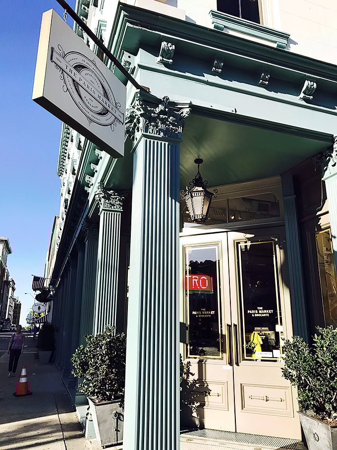 A Parisian postcard come to life! This mint-green fa&ccedil;ade beckons you into a world where Southern charm meets French flair.