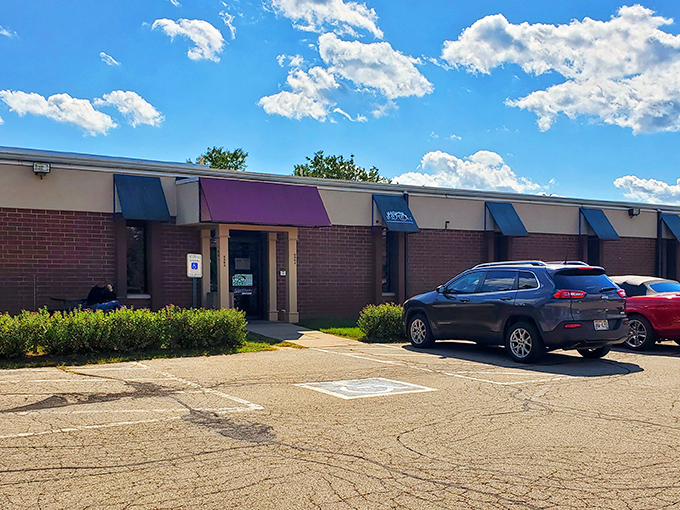 Unassuming exterior, extraordinary interior! This strip mall facade hides a treasure trove of nostalgia and neon-lit joy. Ready to level up your day?