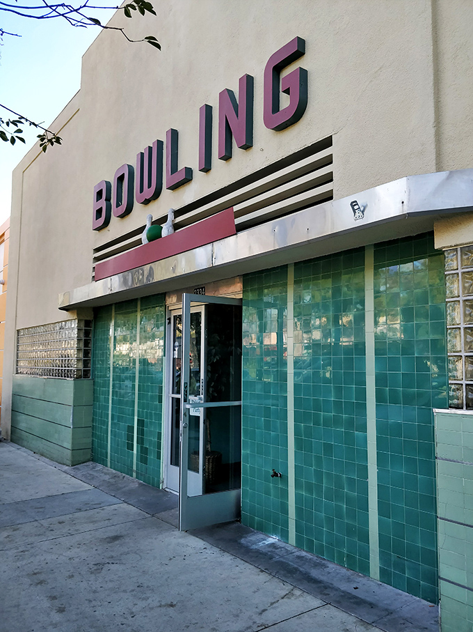 Step into a time warp! This retro facade isn't just eye-catching; it's a portal to the golden age of bowling and burgers.