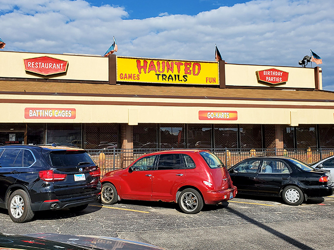 "Welcome to the land of perpetual Halloween! Frankenstein's monster greets visitors with an axe and a suit &ndash; talk about dressed to kill."