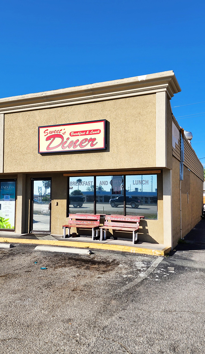 Welcome to flavor town! Sweet's Diner's retro sign promises a trip down memory lane, with a side of crispy bacon.