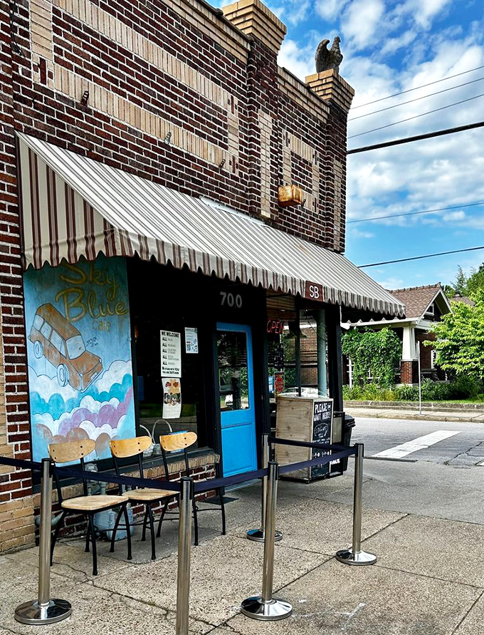 A brick facade with a whimsical mural? Sky Blue Cafe's exterior is like a warm hug for your eyeballs!
