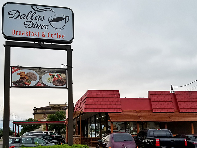 A beacon of breakfast hope! Dallas Diner's sign promises a haven for hungry souls, with a winking coffee cup that seems to say, "Come on in, sleepyhead!"