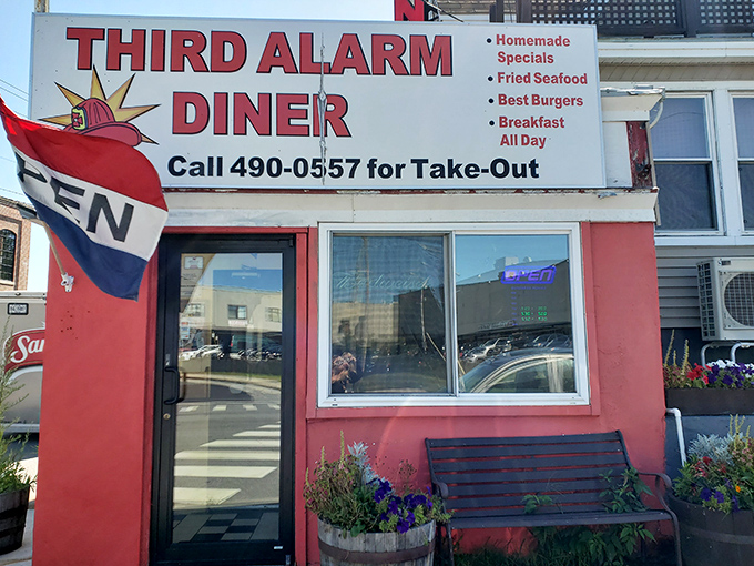 Red alert for flavor! This diner's exterior is as bold as its menu, promising a feast that'll make your taste buds stand at attention.