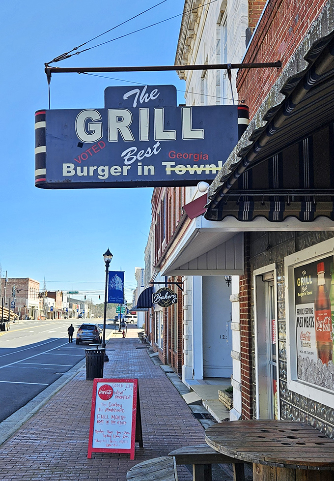 Welcome to burger paradise! The Grill's vintage sign promises the "Best Burger in Town," and boy, does it deliver on that mouthwatering pledge.