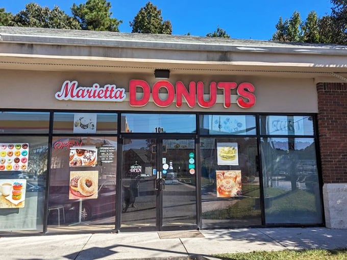 Welcome to donut paradise! Marietta Donuts' storefront promises a sugar-coated adventure that'll make your taste buds do a happy dance.