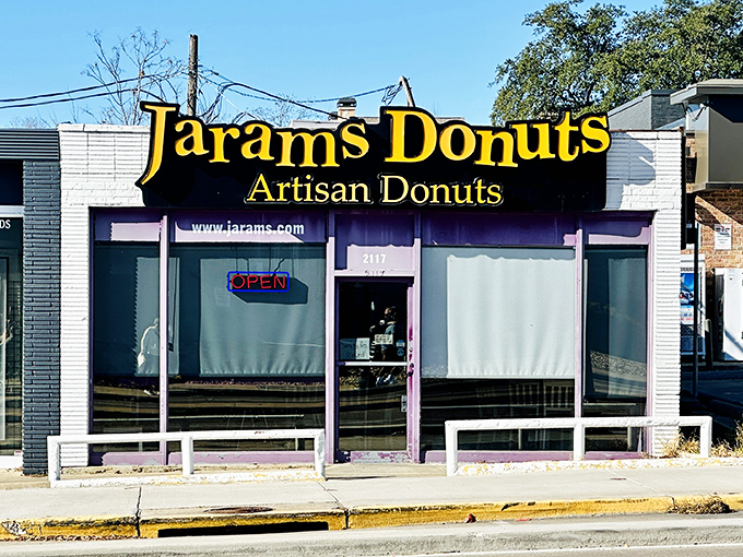 A purple-trimmed beacon of sugary salvation! Jarams Donuts stands out like a confectionery oasis, promising sweet relief from the ordinary.