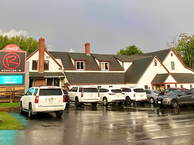A slice of Americana with a side of sizzle! Rustler's Steak House stands proud, its white clapboard and red trim beckoning hungry travelers like a lighthouse for the famished.