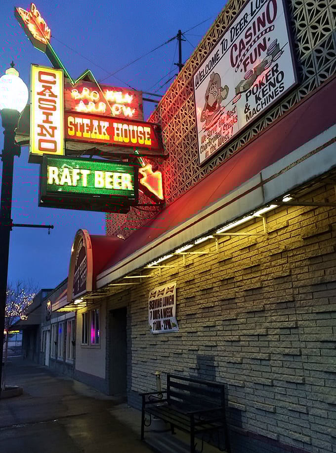 Neon dreams and sizzling steams! This vintage facade is like a beacon for hungry souls in the Montana night.
