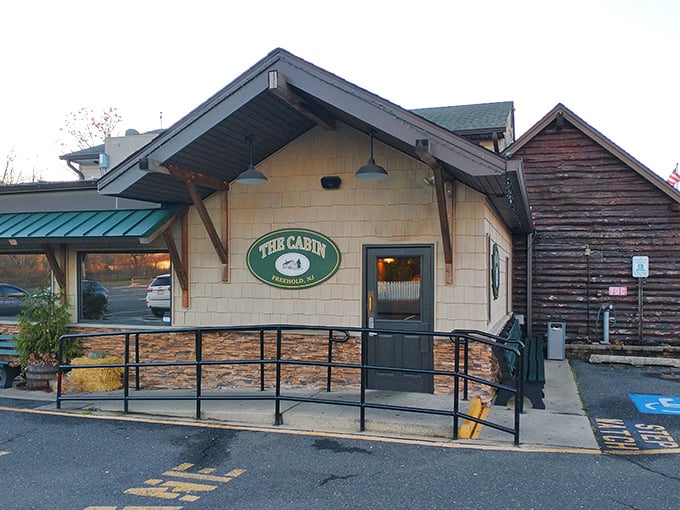 A cabin in the woods? Nope, it's The Cabin Restaurant, where culinary adventures await. This rustic exterior hints at the cozy charm and mouthwatering delights inside.