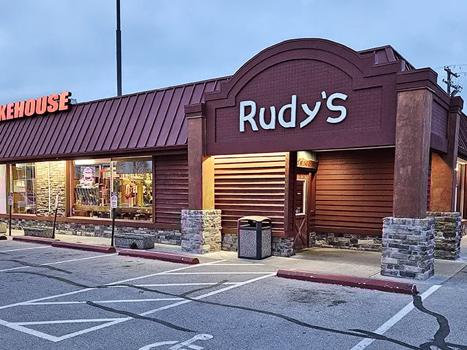 Welcome to flavor town! Rudy's Smokehouse stands proud, its burgundy exterior promising a feast fit for a barbecue king.