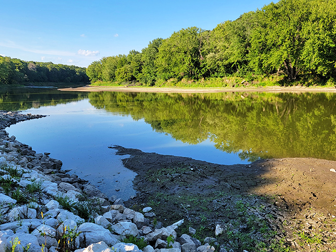 "Who needs a therapist when you've got this view?" A serene river scene invites contemplation and maybe a picnic or two.