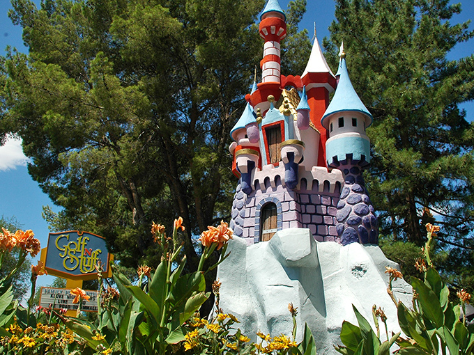 Fairy tales come to life! This whimsical castle, surrounded by vibrant flowers, is your gateway to a world of mini-golf magic and childhood wonder.