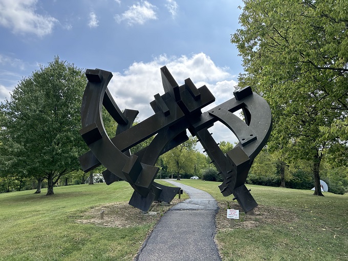 "Welcome to wonderland!" This whimsical sculpture invites you to take a seat or just enjoy the view.